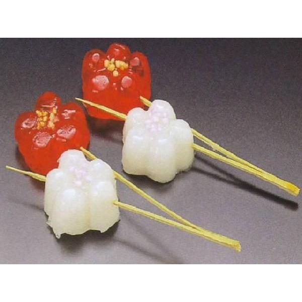 ●一枝あしらうだけで華やかな演出になります。●紅白の梅をイメージして作りました。原材料：水飴　寒天　みじん粉他内容量：約3.5×8cm　約9g/本　20本入（薄甘味）保存方法：要冷凍(-18℃以下)