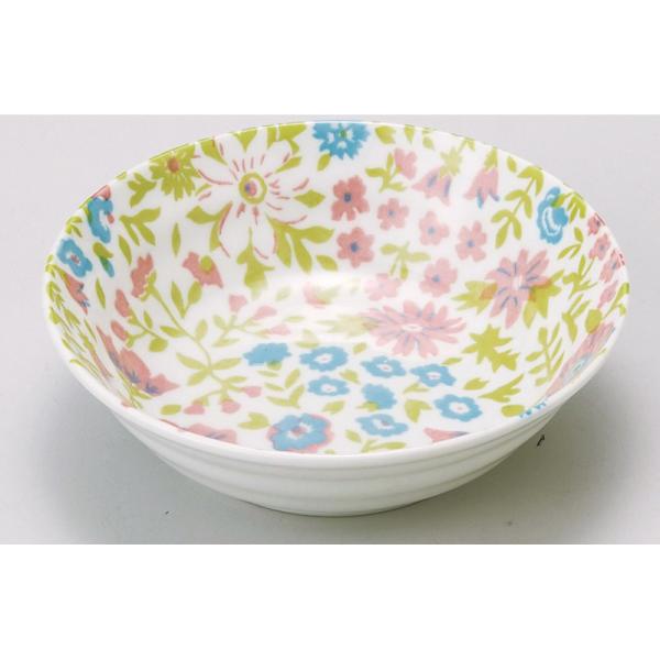 やさしい気持ちになれる、小花柄。　可憐な小花をやさしい色彩で描きました。　オーガニック素材のスープやスイーツなど、ナチュラルな料理と相性抜群。　φ13.3×3.8cm ピンホール・鉄粉が発生することがあります。これは窯で焼く過程でどうしても...