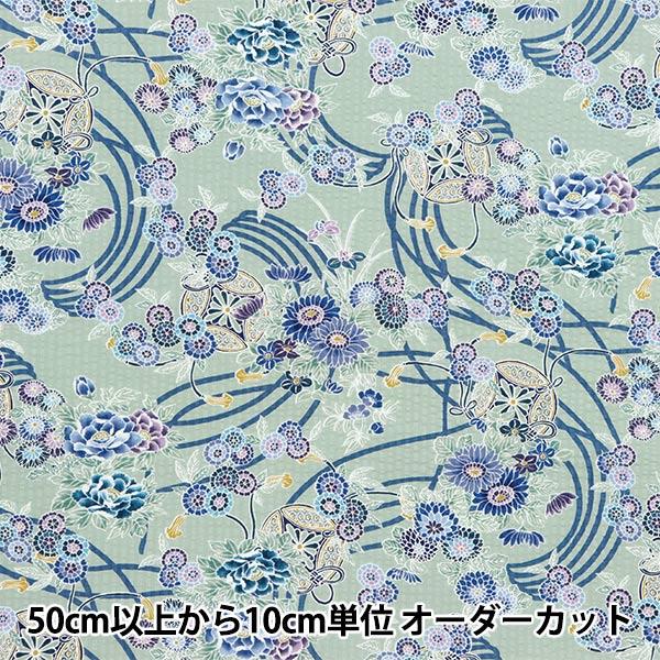 お花と毬と流れのようなひもが華やかな和柄リップル生地です。さざ波のような凹凸が特長的なこの生地は肌に触れる面積が小さくなるので、べとつかず、サラッとした感触の涼感素材です。子どもの甚平・浴衣・パンツ・シャツ・スカート・チュニック・ベビーロン...