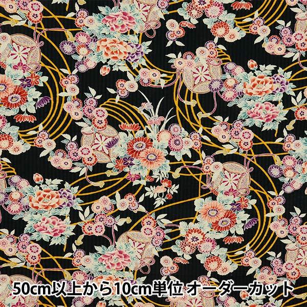 お花と毬と流れのようなひもが華やかな和柄リップル生地です。さざ波のような凹凸が特長的なこの生地は肌に触れる面積が小さくなるので、べとつかず、サラッとした感触の涼感素材です。子どもの甚平・浴衣・パンツ・シャツ・スカート・チュニック・ベビーロン...