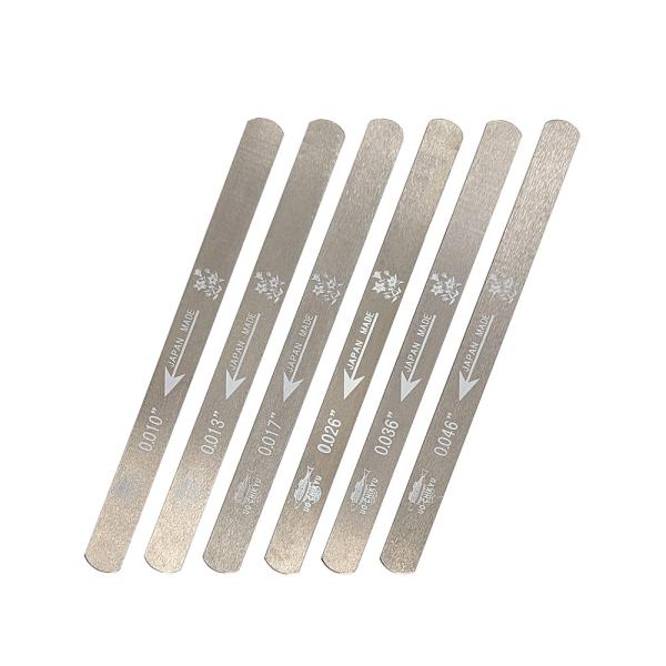 ギター用精密ヤスリメーカーとして世界的に有名な広島鑢製造所製、魚地球印【UO-CHIKYU】のナット溝整形ヤスリエレキ弦でポピュラーな0.010〜0.046インチのゲージに対応する6本セットヤスリの厚みを弦の太さに合わせてありますので、ジャ...