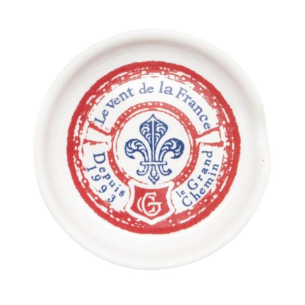 サイズ：約直径4.8×高さ0.9cm素　材：陶器（磁器）※定形外郵便物ＯＫブランド：le grand cheminデザイン：スプーンレスト 紋章 百合 花 白色 赤色 青色陶器で作られたグランシュマンオリジナルデザインのスプーンレスト。陶磁...