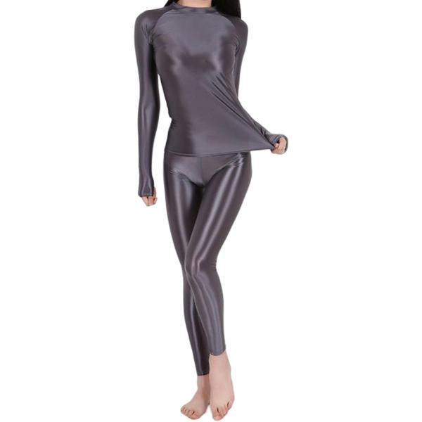 バリエーションコード : 2B2YPJ6OI1上下とも光沢感、つるつる感のある伸縮繊維で全身光沢を楽しめるセパレートタイプのレギンスです。高弾力スパンデックス生地が貴女の身体を美しく艶やかに包み込みます。伸縮性に富んた素材は身体のラインを綺...