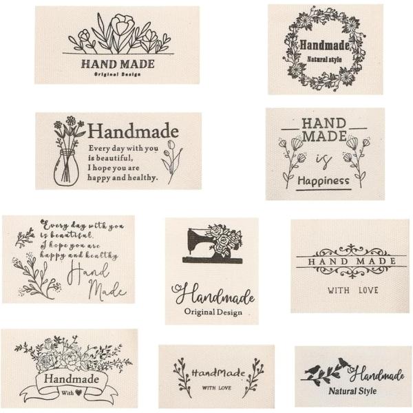 「ワンランク上の仕上がりに」ハンドメイド作品に縫い付けるだけで、完成度を引き上げるコットン製布タグ。ナチュラルで北欧風の英字デザインが、作品にやさしいアクセントを加えます。「使いやすい縫い付け仕様」裏面に折り目がついており、布端の処理なしで...