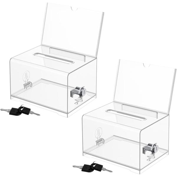 「透明なアクリル製貯金箱」透明で中が見える鍵付きアクリルボックスです。中身が見えるので、楽しくコツコツと貯金が出来ます。「幅広い用途で使えます」鍵付きのアクリルボックスなので他の人に開けられることが無く安心です。投票箱や募金箱の他、アンケー...