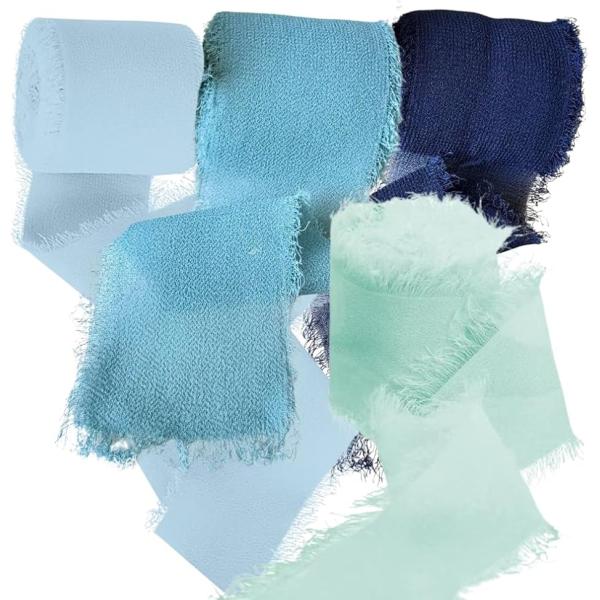 バリエーションコード : 2B9X6SYND3「ワンランク上の装飾」柔らかなシフォン生地と切りっぱなしの風フリンジが魅力のリボンセット。コットンのような優しい質感で、花束や手芸など多用途に活躍します。「結婚式やウエディングに最適」透け感のあ...