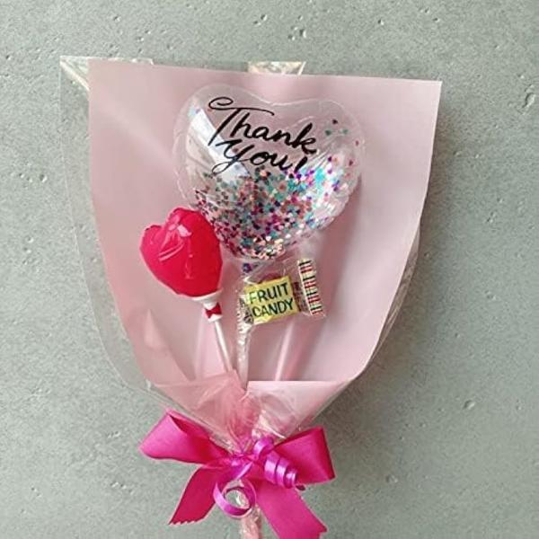 バリエーションコード : 2B44Y4KQWWキラキラしたラメ入りのThank youキャンディブーケおよそ26x20cmの大きさ　フルーツキャンディつきです。バルーンを振ると中に入ったピンクのラメがキラキラしてすごくかわいいですありがとう...