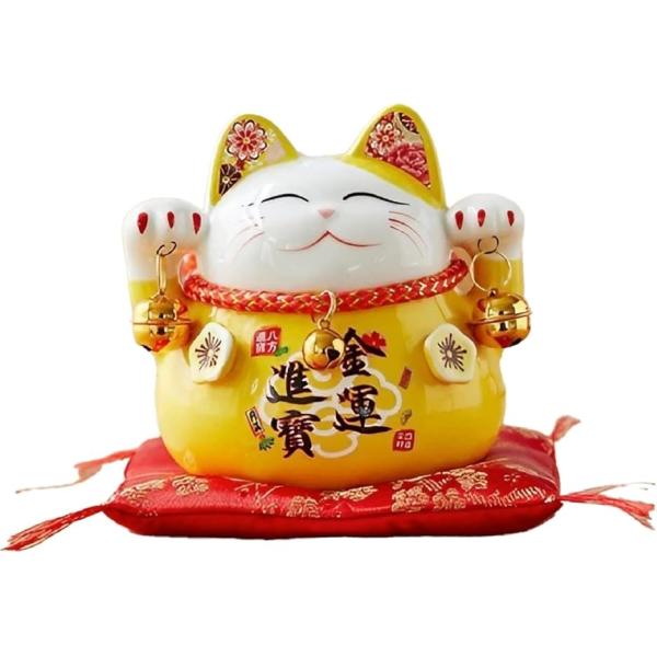 可愛くて実用的な貯金箱になる招き猫：とろけるような満面の笑みを浮かべた姿が魅力の招き猫です。金運アップにピッタリの綺麗なイエローカラーとゴールドの鈴がポイントで、後頭部にコインスロットがあるので貯金箱としてお使いいただけます。金運アップや招...