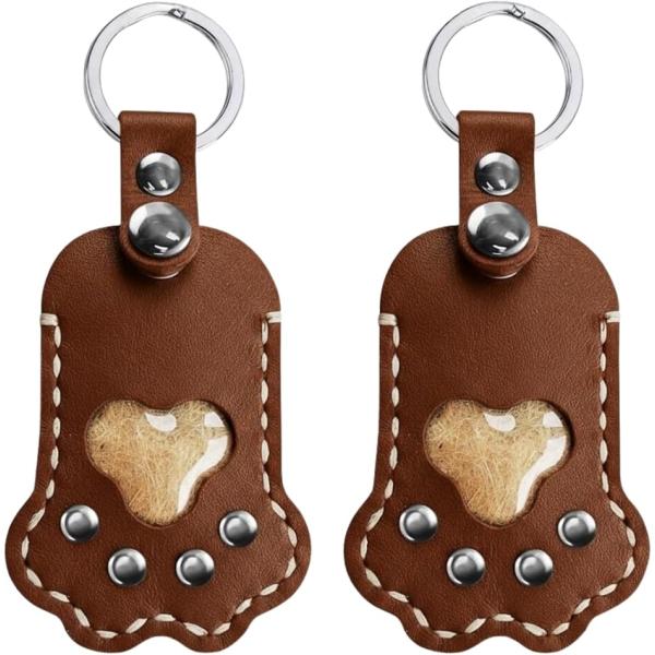 バリエーションコード : 2BRC6GNKRF＊思い出を形にする心温まるメモリアルグッズ＊大切なペットの思い出の毛をそっと保管できる収納ケース＊オシャレな肉球形デザインで、日常になじむ仕様＊バッグや鍵に付けて毎日持ち歩けるコンパクトサイズ＊...