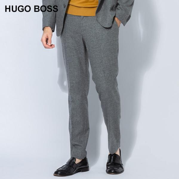 HUGO BOSS（ヒューゴ ボス）は、ドイツ発のラグジュアリーファッションブランドで、クラシックなスタイルと洗練されたデザインが特徴です。一歩進んだ、BOSSのフォーマルパンツ。ひときわ心地良いウエストバンドが特徴的な、スリムフィットのパ...