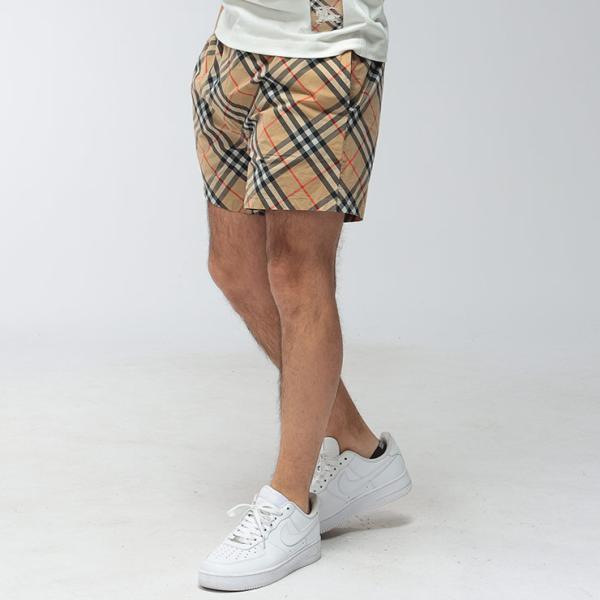 BURBERRY（バーバリー）は、イギリスのファッションブランドで、アイコニックなチェック柄と高級感あるアパレルが特徴です。バーバリーのアイコニックなヴィンテージチェックを全面に落とし込んだ、気品漂うスイムショーツです。一目でそれと分かる伝...