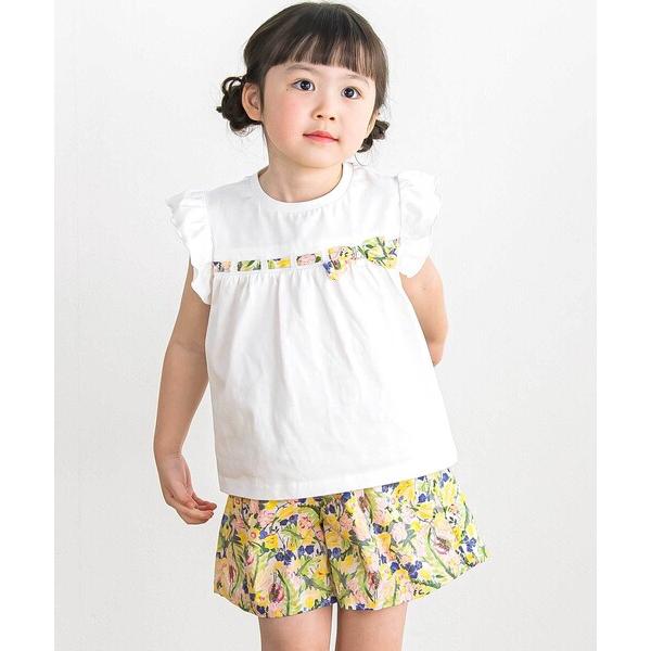 ZOZO問い合わせ番号:106916581ショップ:BEBE ONLINE STORE，ベベ オンラインストアブランド:BeBe Petits Pois Vert，ベベプチポワヴェール商品名:【店舗限定】フラワーリボンフリルトップス＆ショー...
