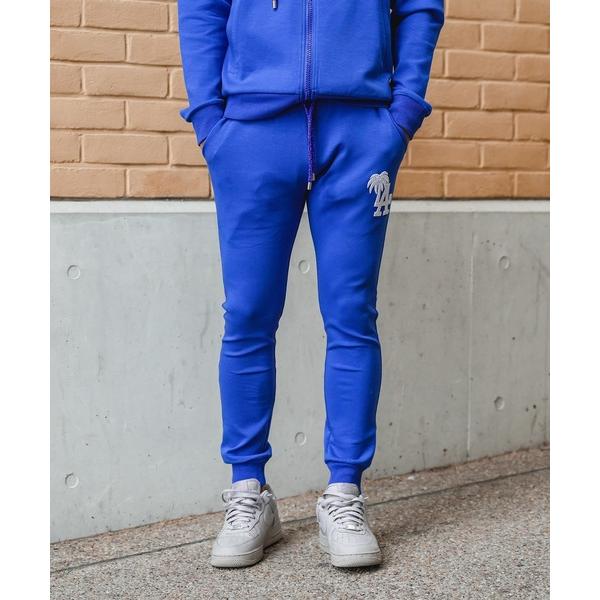 ZOZO問い合わせ番号:107072332ショップ:adamsJUGGLER，アダムスジャグラーブランド:adamsJUGGLER，アダムスジャグラー商品名:RTEGパームツリーLAロングパンツカテゴリ:パンツ>スウェットパンツブラン...