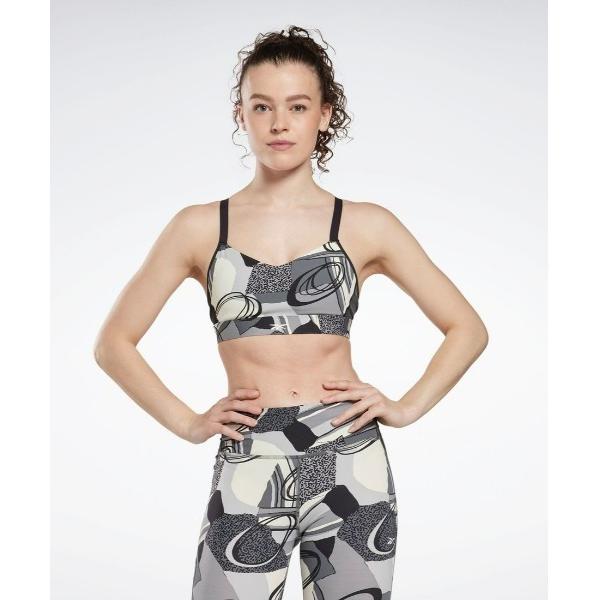 『セール実施中』ZOZO問い合わせ番号:67636749ショップ:Reebok，リーボックブランド:Reebok，リーボック商品名:ラックス パフォーム グラフィック ストラッピー ブラ / Lux Perform Graphic Stra...