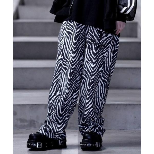 ZOZO問い合わせ番号:91873876ショップ:A'GEM/9 × .kom，エージェムナインブランド:REFLEM，レフレム商品名:『REFLEM/レフレム』アニマルクロス刺繍スウェットパンツカテゴリ:パンツ>スウェットパンツブラ...