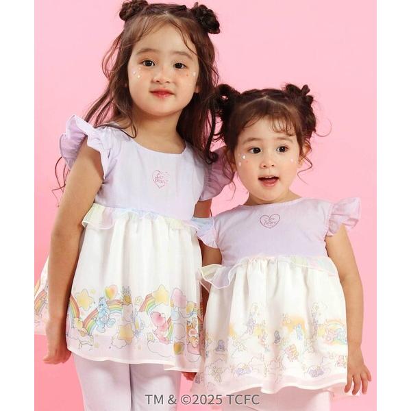 『セール実施中』ZOZO問い合わせ番号:97356607ショップ:BEBE ONLINE STORE，ベベ オンラインストアブランド:SLAP SLIP，スラップスリップ商品名:【ケアベア×SLAP SLIP】肩フリル裾プリントチュニック(...