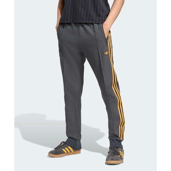 『セール実施中』ZOZO問い合わせ番号:97489451ショップ:adidas，アディダスブランド:adidas，アディダス商品名:マンチェスター・ユナイテッドのテラスアイコントラックパンツ / アディダス adidasカテゴリ:パンツ&g...