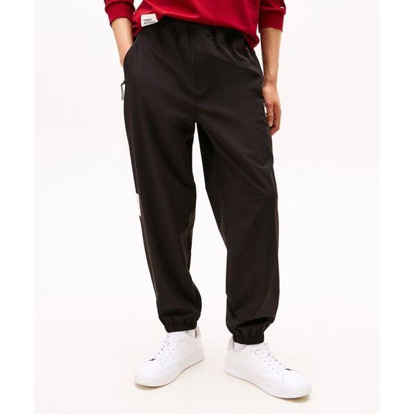 『タイムセール実施中』ZOZO問い合わせ番号:98815385ショップ:TOMMY HILFIGER，トミー ヒルフィガーブランド:TOMMY HILFIGER，トミーヒルフィガー商品名:MODERN ATHLETICナイロントラックパンツ...