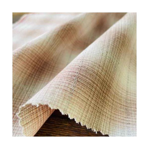 Ombre Checkワッシャー仕上げ。色と織り糸の組合せでグラデーションを表現した繊細な先染め生地です。目立たない色糸のドビー織りで表現したアクセントステッチが品良く効いています。パッチワークではベースとして使うことができそうです。■30...