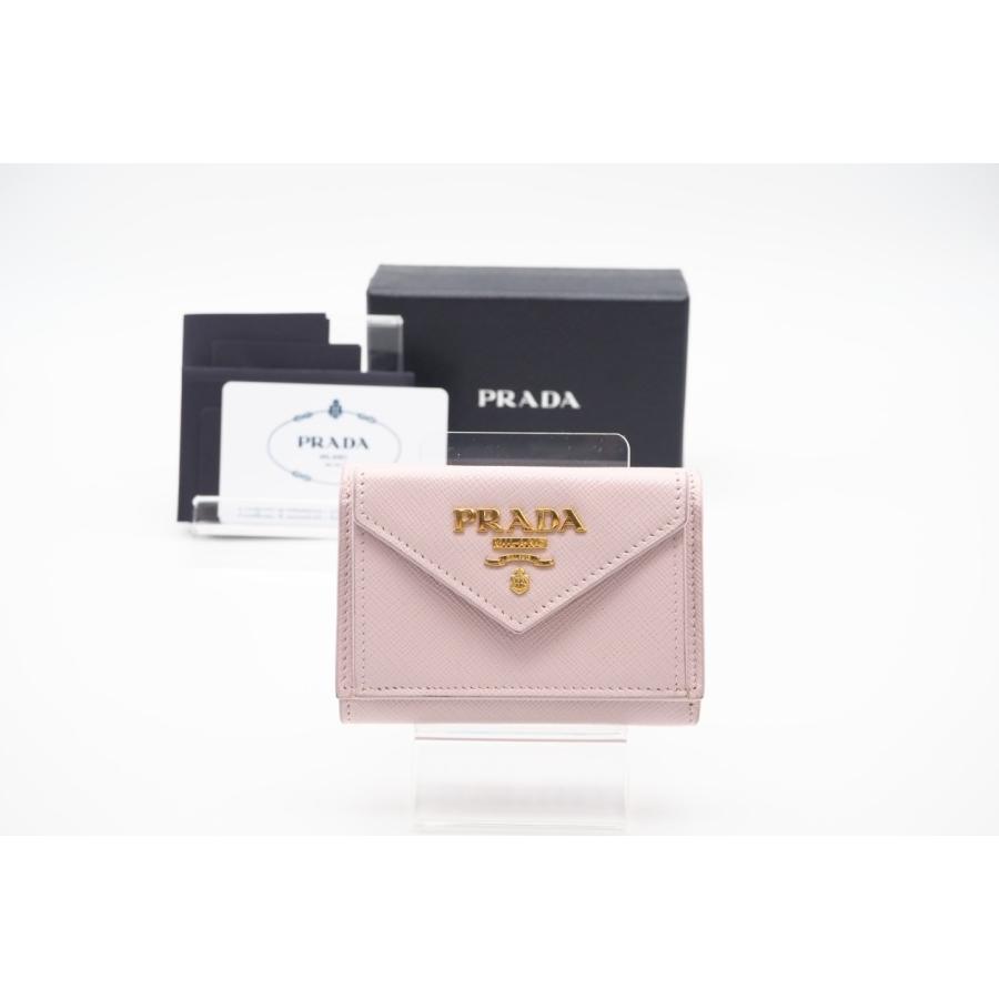 ☆安心の3大保証☆ ABランク ≪PRADA プラダ/三つ折り財布≫ 1MH021 メタルロゴ サフィアーノ ピンク 美品 : リユース ...