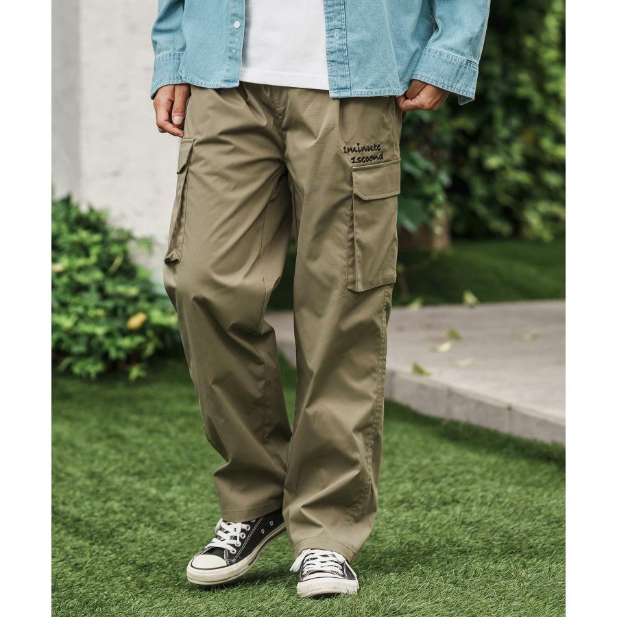1minute 1second（ワンミニットワンセカンド） cargo pants with cursive embroidery カーゴ ...