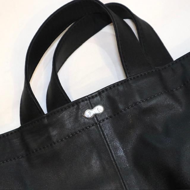 PEANUTS＆CO 限定 Peanuts&Co ACVM コラボ WAXED COTTON NEWS PAPER BAG Black ...