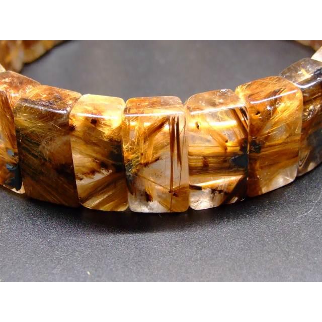 天然石 パワーストーン 65478 太陽ルチルクォーツ 針水晶 16mm×8mm 4A バングル ブレスレット 内径19cm ポーチ付き 送料 ...