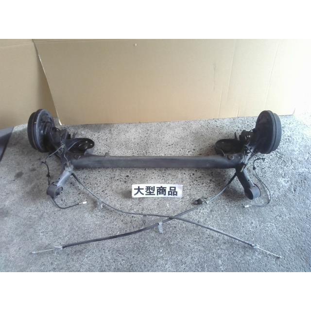 トヨタ（TOYOTA）※同梱不可※ラクティス NSP120 リアアクスルビーム 品番 42110-52332 ドラム サイドワイヤー ABS付 ...
