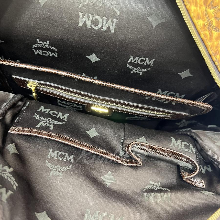 エムシーエム MCM パイソン柄スタッズバックパック ブラウン :8071000106452:カインドオルYahoo!店 - 通販 - Yahoo!ショッピング