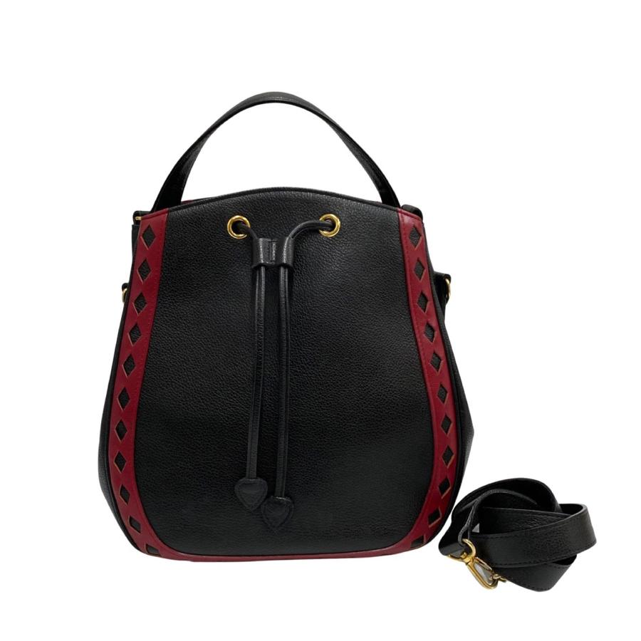 Yves Saint Laurent 極 美品 YVES SAINT LAURENT イヴ・サンローラン カットアウト 巾着 レザー 本革 ...