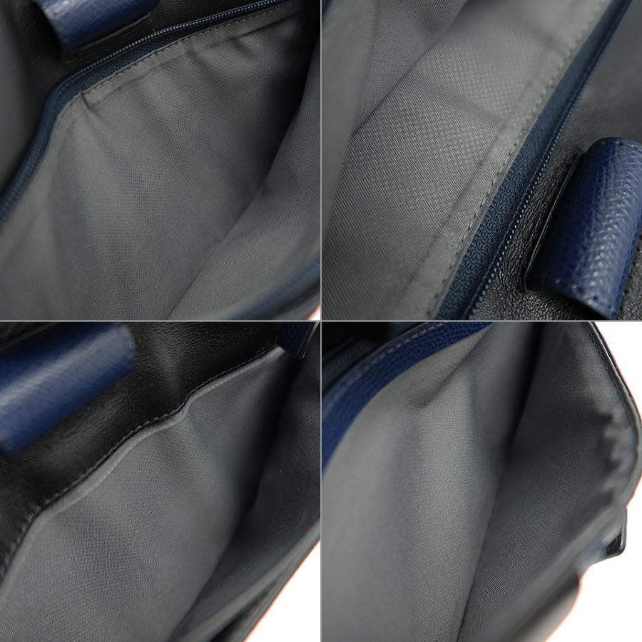 TUMI トゥミ トラベルウォレット レザー ブルー×ブラック 【丸万 TUMI トゥミ トラベルウォレット レザー ブルー×ブラック 【丸万