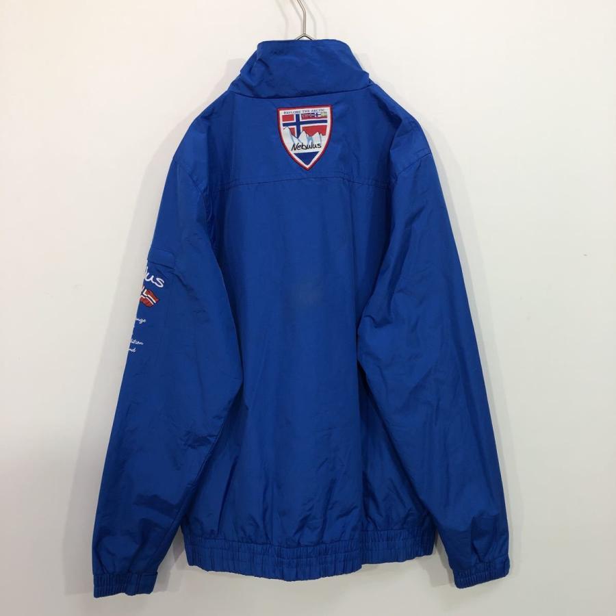 nebulus ナイロンジャケット Mサイズ ウィンドブレーカー ジャンパー スポーツウェア ブルー アメリカ古着 J*N 2206-1008 ...