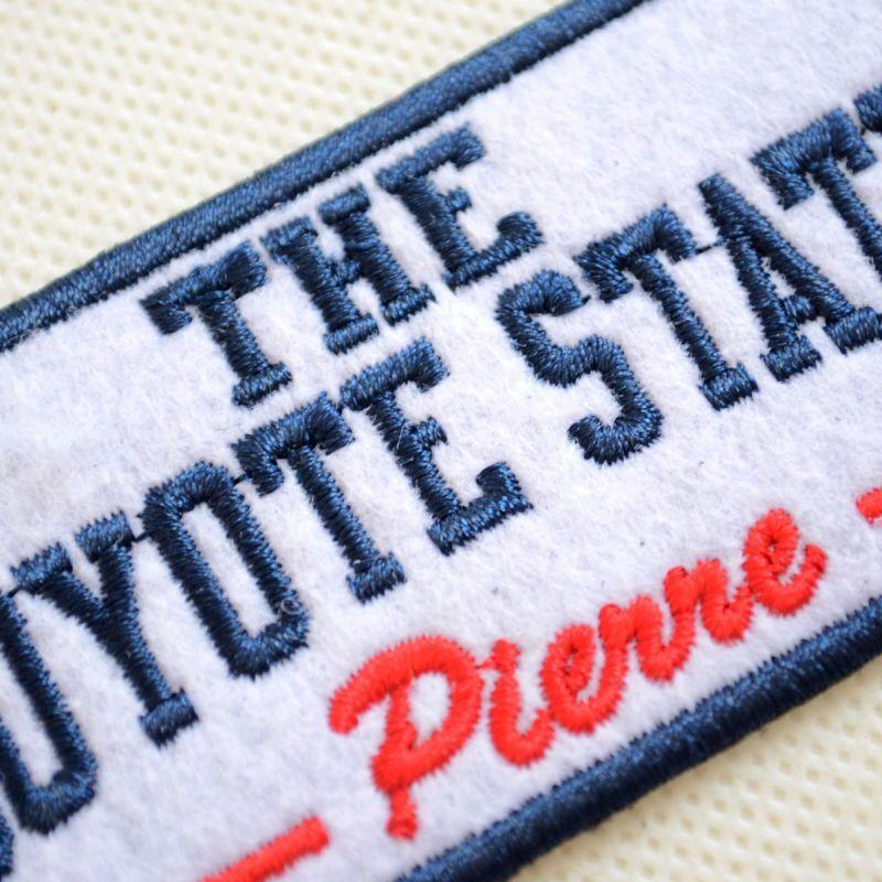 ワッペン アイロン おしゃれ 刺繍 USAアドバタイジングワッペン THE COYOTE STATE ネイビー＆ホワイト 名前 作り方 ...