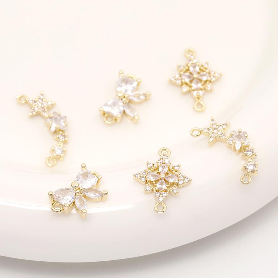 色褪せにくい14KGPゴールドメッキ 高品質ジルコニアチャーム リボン 雪の結晶 4連星形 2カン : ビーズアンドパーツ - 通販 - Yahoo!ショッピング